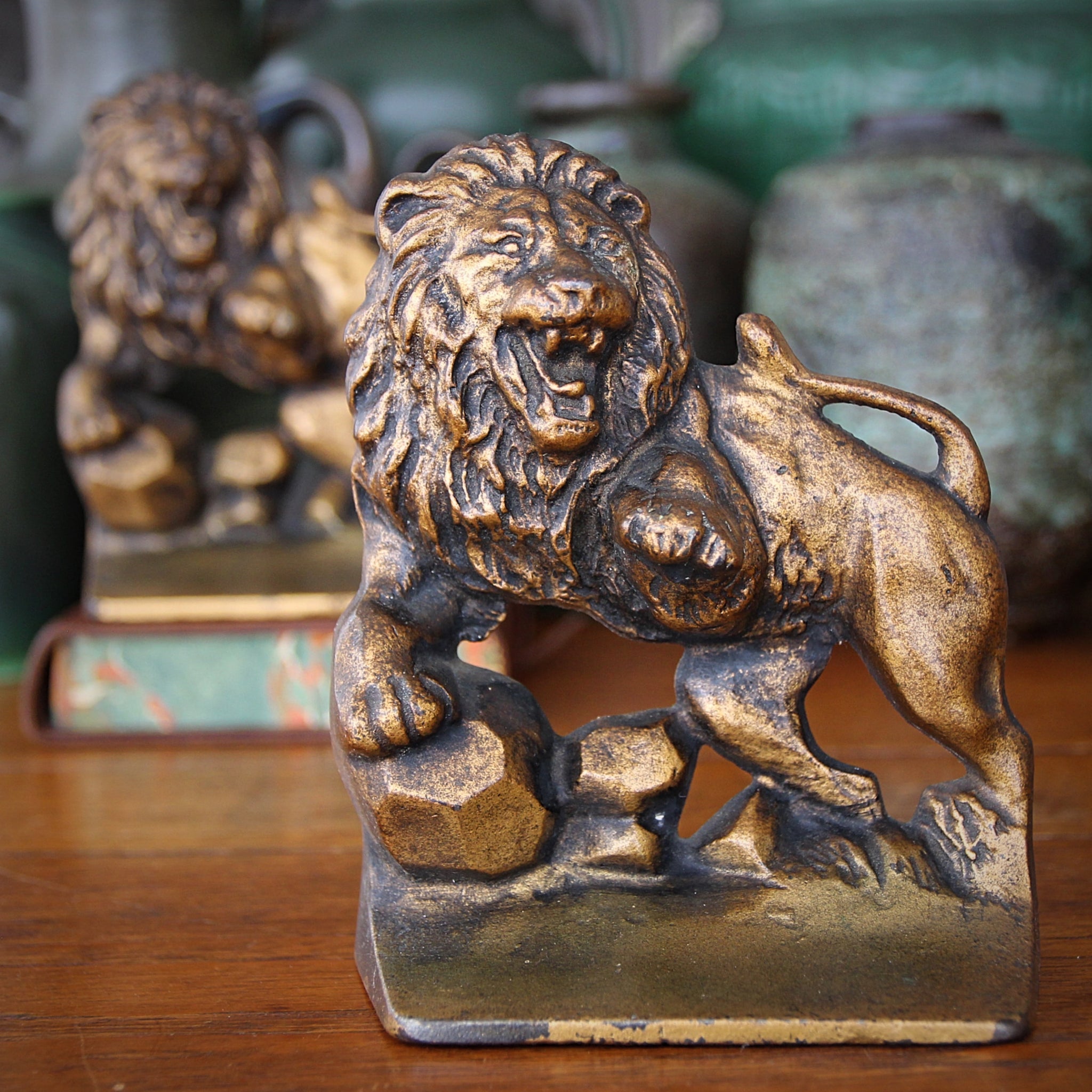 Cast Iron Fierce Lion Bookends with Aged Golden Finish – LEO Design, Ltd.